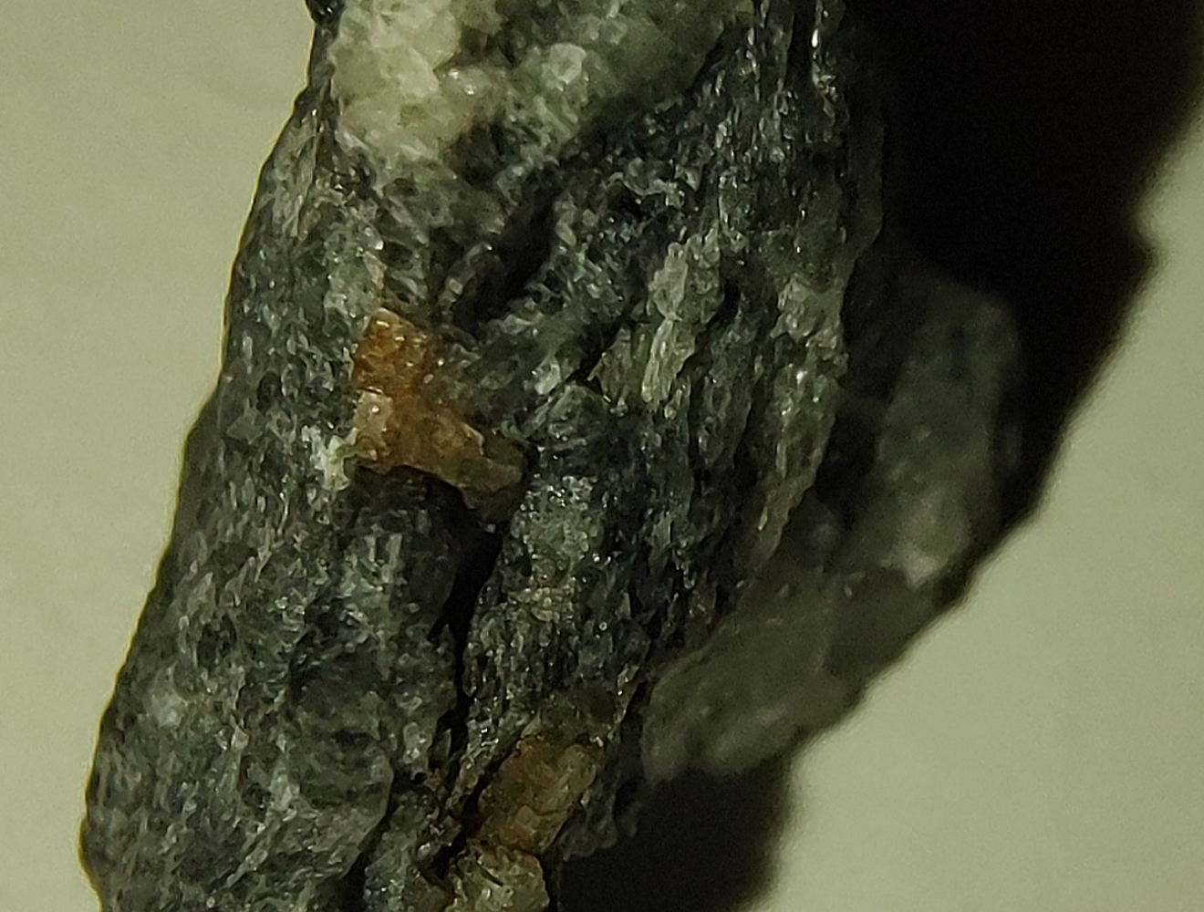 Identity Help : Mystery yellow crystals in Wernerite