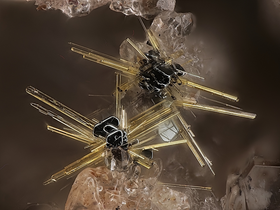 Dark olive enstatite crystals with black ilmenite crystals and crude ...