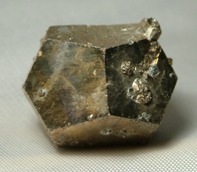 Large pyrite cube measuring 45 x 31 x 30 mm partially wrapped up by ...