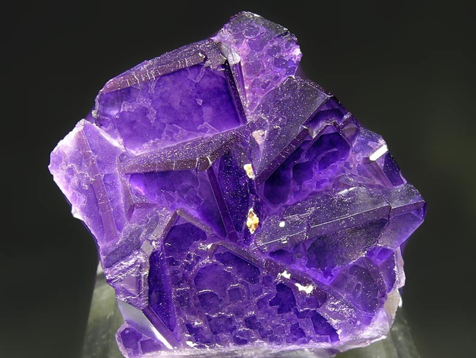 A group of cubic crystals that have very sharp and bright faces and ...