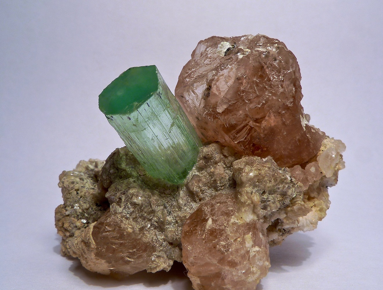 Photos : Beryl-Topaz Incompatibility?