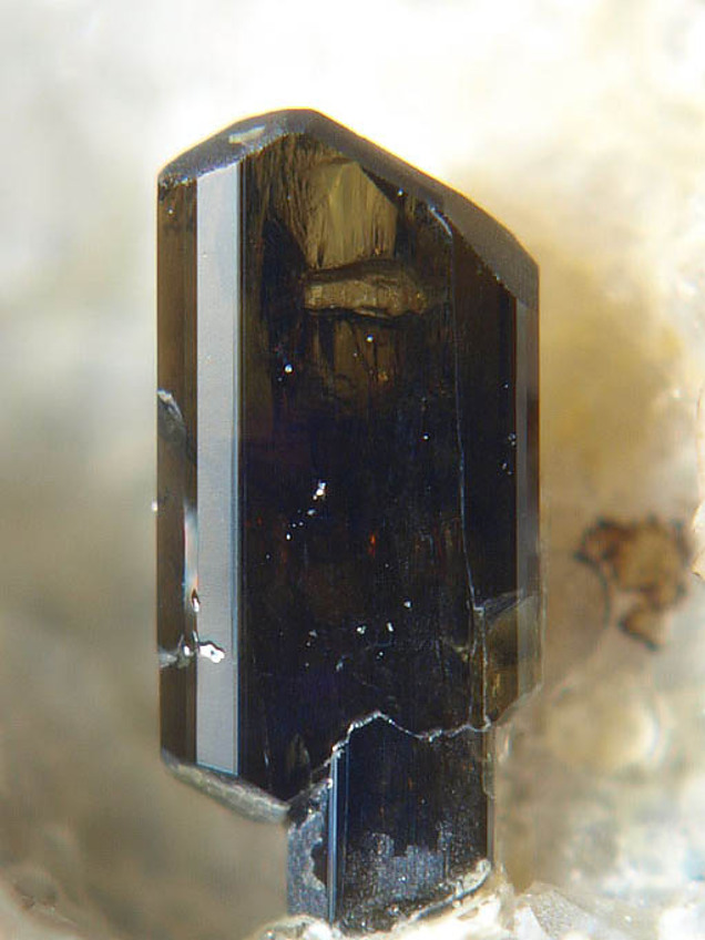 Dark olive enstatite crystals with black ilmenite crystals and crude ...