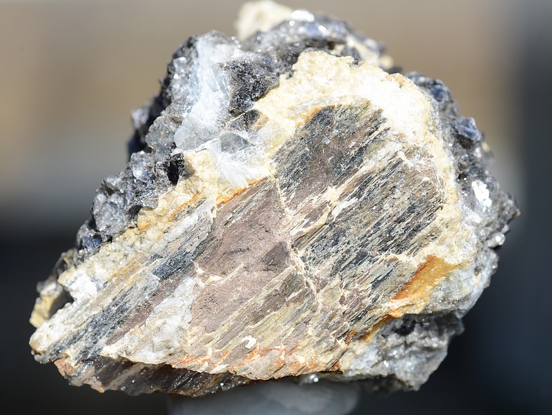 Pinite, Spodumene, Zinnwaldite, Albite (Var: Cleavelandite)