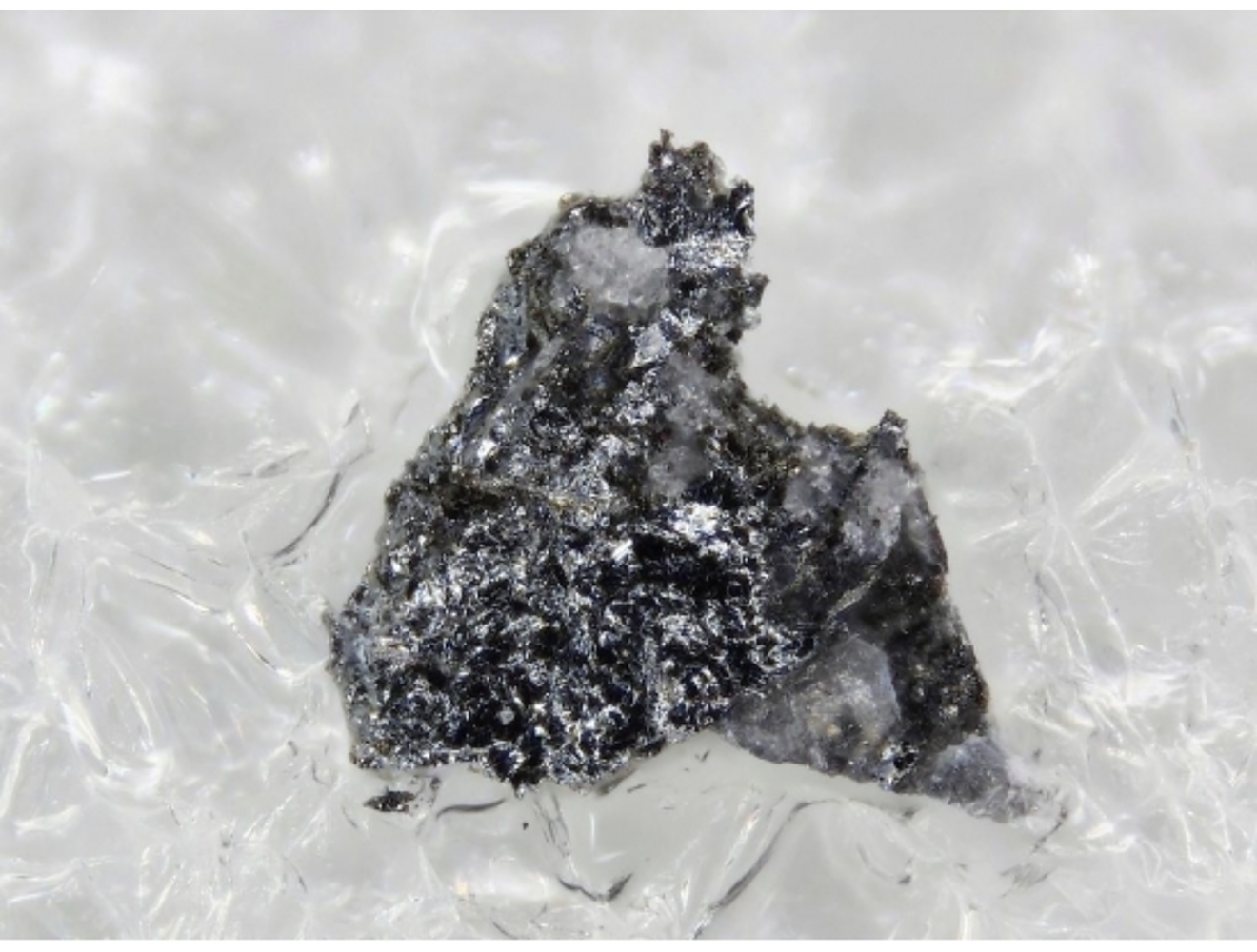 Menchettiite: Mineral information, data and localities.