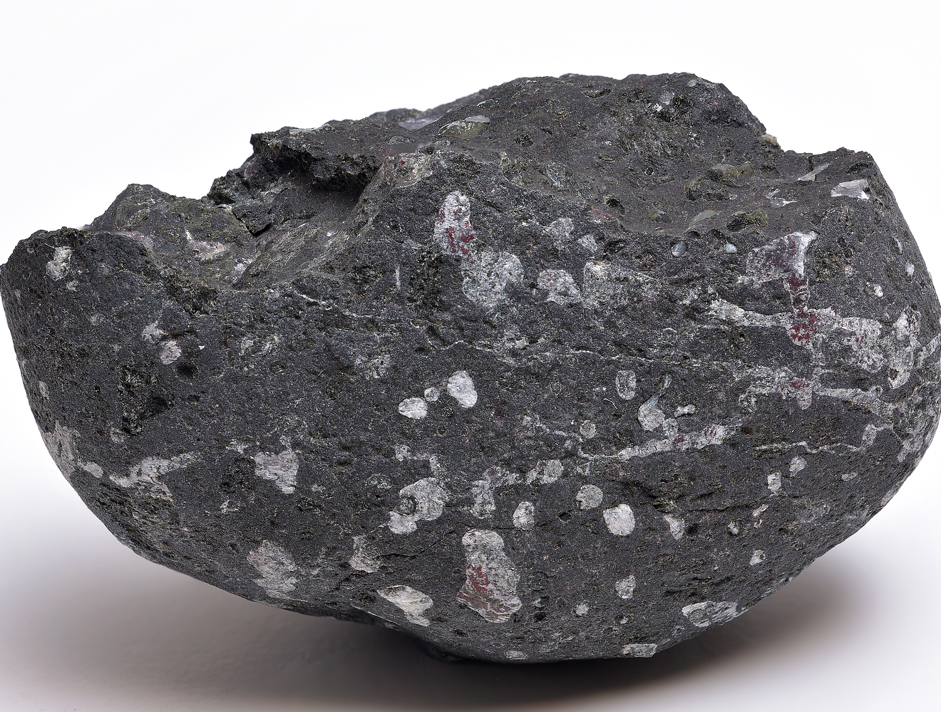 Identity Help : vesicular basalt with a mix of minerals?