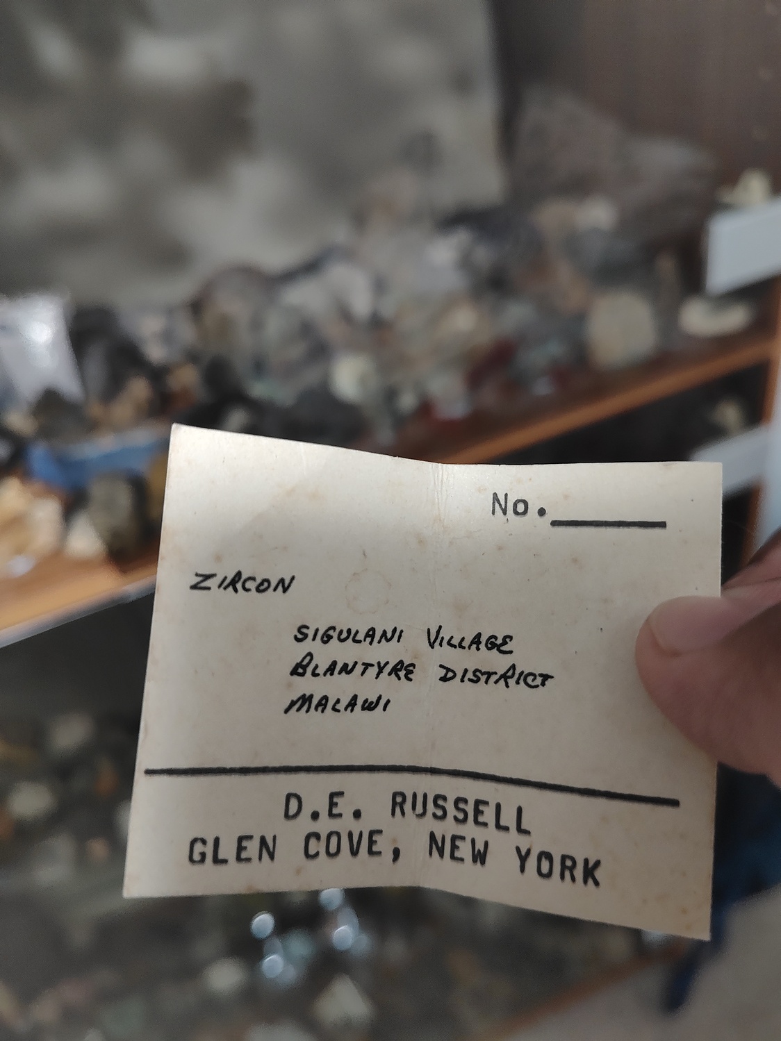 General : Owner of zircon and label- D.E. Russell?