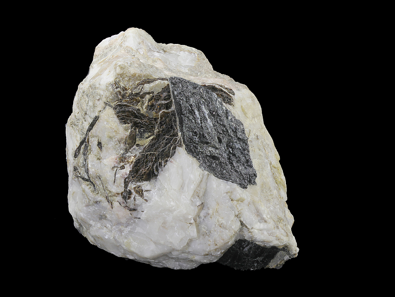 Sizeable crystal with smaller divergent neighbours