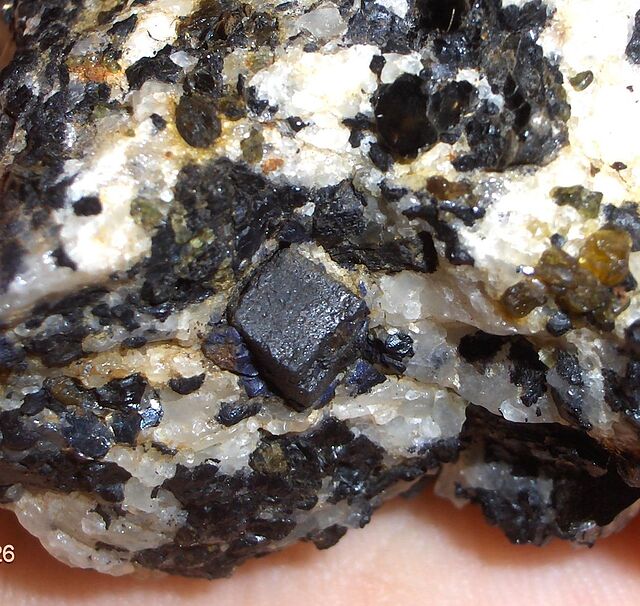 Uraninite, Calcite, Fluorite, Biotite, Apatite